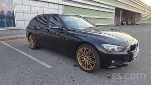 Black BMW 318 2012 in Riga, with an engine capacity of 2.00 L and mileage of 247 thousand km for 5950 €, photo 3 on AUTOMOTO.COM.LV