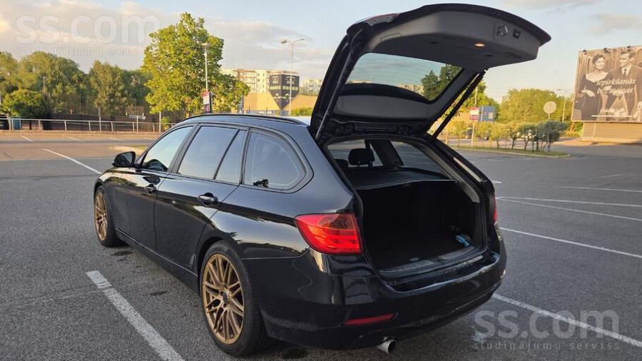 Black BMW 318 2012 in Riga, with an engine capacity of 2.00 L and mileage of 247 thousand km for 5950 €, photo 10 on AUTOMOTO.COM.LV