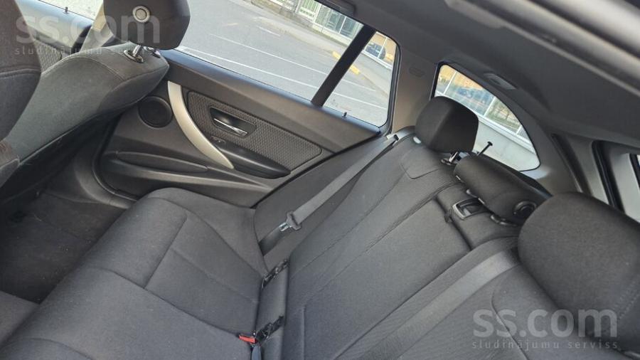Black BMW 318 2012 in Riga, with an engine capacity of 2.00 L and mileage of 247 thousand km for 5950 €, photo 12 on AUTOMOTO.COM.LV