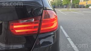 Black BMW 318 2012 in Riga, with an engine capacity of 2.00 L and mileage of 247 thousand km for 5950 €, photo 17 on AUTOMOTO.COM.LV