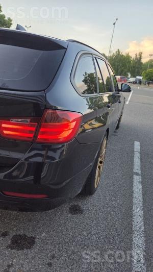 Black BMW 318 2012 in Riga, with an engine capacity of 2.00 L and mileage of 247 thousand km for 5950 €, photo 18 on AUTOMOTO.COM.LV