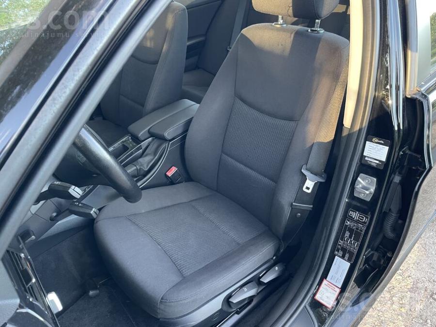 Black BMW 318 2012 in Riga, with an engine capacity of 2.00 L and mileage of 251 thousand km for 5790 €, photo 12 on AUTOMOTO.COM.LV
