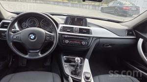 Black BMW 318 2012 in Riga, with an engine capacity of 2.00 L and mileage of 246 thousand km for 6250 €, photo 12 on AUTOMOTO.COM.LV