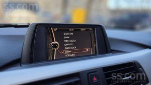 Black BMW 318 2012 in Riga, with an engine capacity of 2.00 L and mileage of 246 thousand km for 6250 €, photo 18 on AUTOMOTO.COM.LV