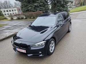 Black BMW 318 2012 in Riga, with an engine capacity of 2.00 L and mileage of 265 thousand km for 7490 €, photo 4 on AUTOMOTO.COM.LV