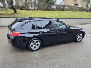 Black BMW 318 2012 in Riga, with an engine capacity of 2.00 L and mileage of 265 thousand km for 7490 €, photo 8 on AUTOMOTO.COM.LV