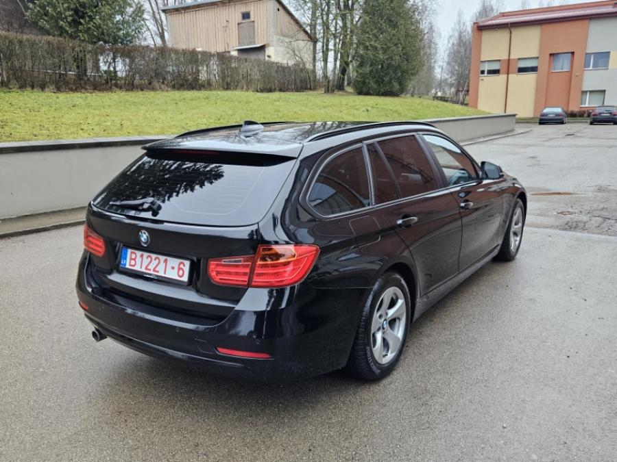 Black BMW 318 2012 in Riga, with an engine capacity of 2.00 L and mileage of 265 thousand km for 7490 €, photo 9 on AUTOMOTO.COM.LV
