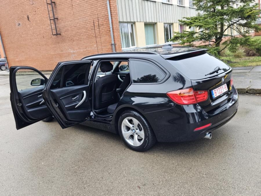 Black BMW 318 2012 in Riga, with an engine capacity of 2.00 L and mileage of 265 thousand km for 7490 €, photo 16 on AUTOMOTO.COM.LV
