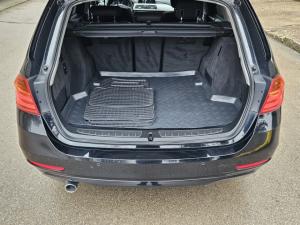 Black BMW 318 2012 in Riga, with an engine capacity of 2.00 L and mileage of 265 thousand km for 7490 €, photo 18 on AUTOMOTO.COM.LV