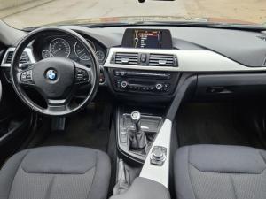Black BMW 318 2012 in Riga, with an engine capacity of 2.00 L and mileage of 265 thousand km for 7490 €, photo 22 on AUTOMOTO.COM.LV