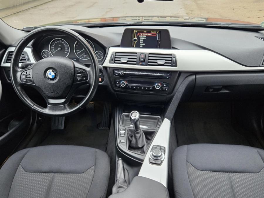 Black BMW 318 2012 in Riga, with an engine capacity of 2.00 L and mileage of 265 thousand km for 7490 €, photo 22 on AUTOMOTO.COM.LV