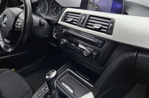 Black BMW 318 2012 in Riga, with an engine capacity of 2.00 L and mileage of 265 thousand km for 7490 €, photo 26 on AUTOMOTO.COM.LV