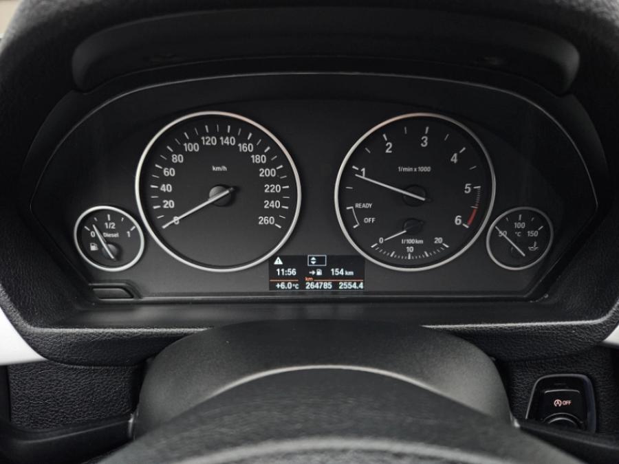 Black BMW 318 2012 in Riga, with an engine capacity of 2.00 L and mileage of 265 thousand km for 7490 €, photo 32 on AUTOMOTO.COM.LV
