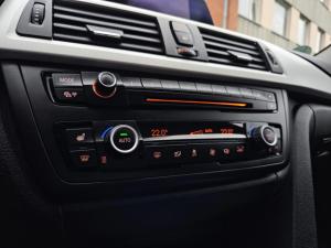 Black BMW 318 2012 in Riga, with an engine capacity of 2.00 L and mileage of 265 thousand km for 7490 €, photo 36 on AUTOMOTO.COM.LV