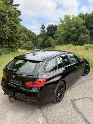 Black BMW 318 2012 in Utena, with an engine capacity of 2.00 L and mileage of 212 thousand km for 6200 €, photo 4 on AUTOMOTO.COM.LV