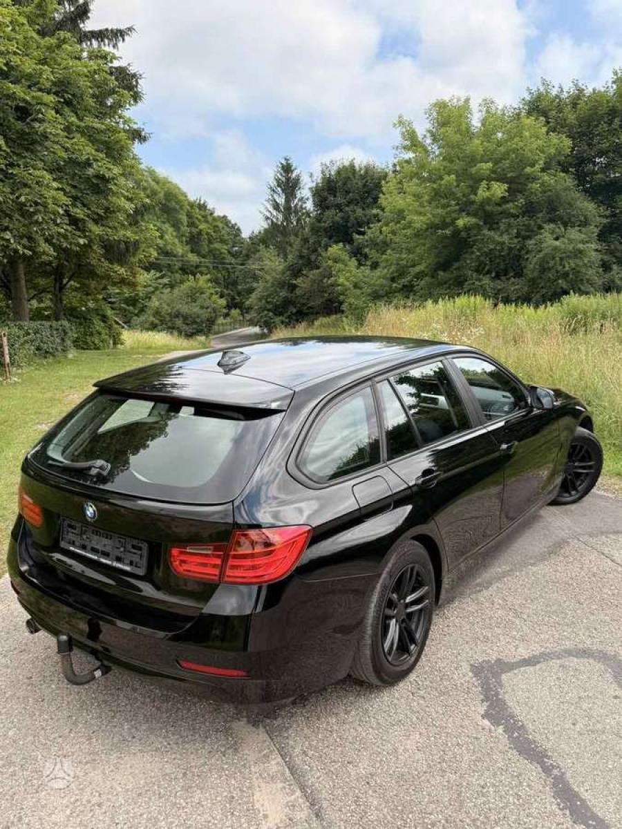 Black BMW 318 2012 in Utena, with an engine capacity of 2.00 L and mileage of 212 thousand km for 6200 €, photo 4 on AUTOMOTO.COM.LV