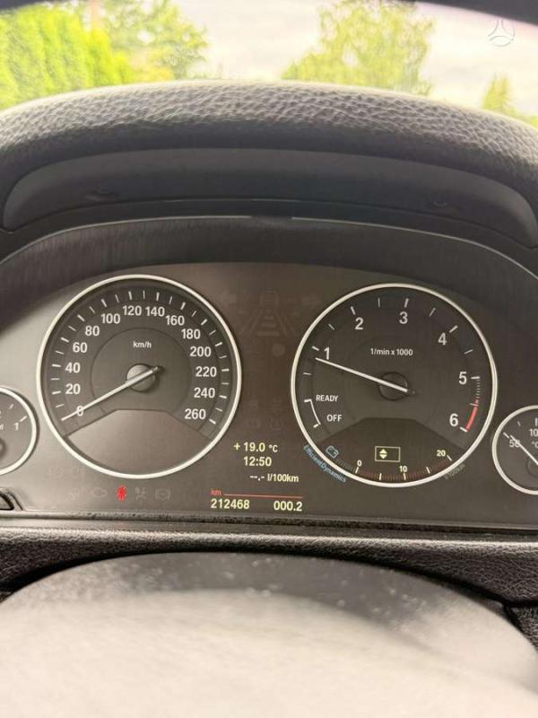 Black BMW 318 2012 in Utena, with an engine capacity of 2.00 L and mileage of 212 thousand km for 6200 €, photo 5 on AUTOMOTO.COM.LV