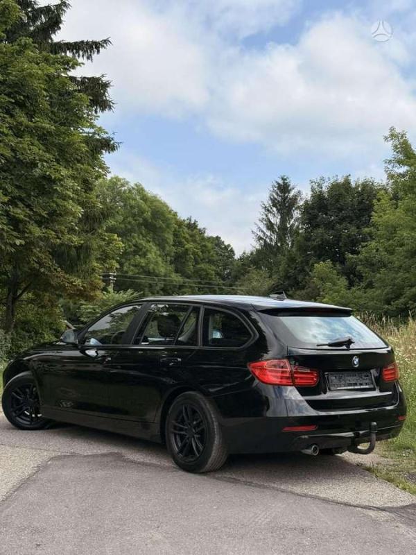 Black BMW 318 2012 in Utena, with an engine capacity of 2.00 L and mileage of 212 thousand km for 6200 €, photo 6 on AUTOMOTO.COM.LV