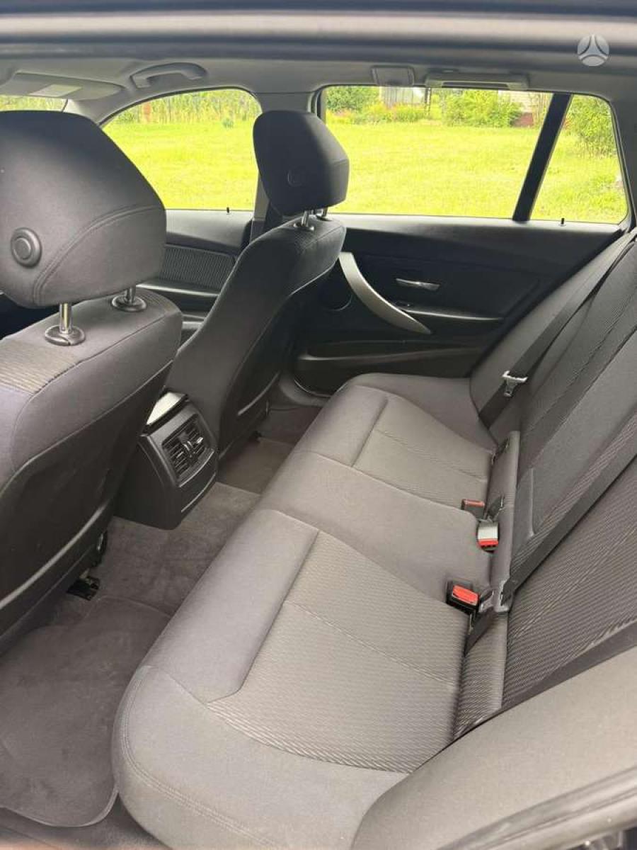 Black BMW 318 2012 in Utena, with an engine capacity of 2.00 L and mileage of 212 thousand km for 6200 €, photo 9 on AUTOMOTO.COM.LV