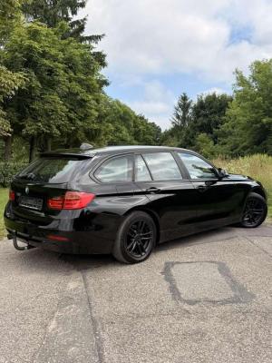 Black BMW 318 2012 in Utena, with an engine capacity of 2.00 L and mileage of 212 thousand km for 6200 €, photo 11 on AUTOMOTO.COM.LV