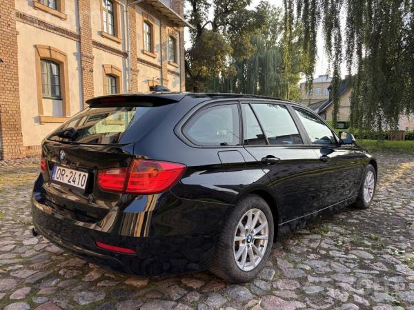 Black BMW 318 2012 in Bauska, with an engine capacity of 2.00 L and mileage of 345 thousand km for 5890 €, photo 6 on AUTOMOTO.COM.LV