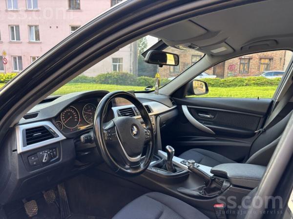 Black BMW 318 2012 in Bauska, with an engine capacity of 2.00 L and mileage of 345 thousand km for 5890 €, photo 10 on AUTOMOTO.COM.LV