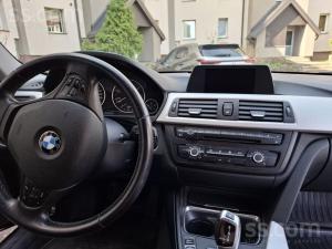 Black BMW 318 2013 in Riga, with an engine capacity of 2.00 L and mileage of 313 thousand km for 7200 €, photo 8 on AUTOMOTO.COM.LV