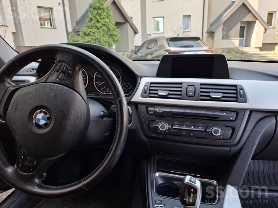 Black BMW 318 2013 in Riga, with an engine capacity of 2.00 L and mileage of 313 thousand km for 7200 €, photo 8 on AUTOMOTO.COM.LV