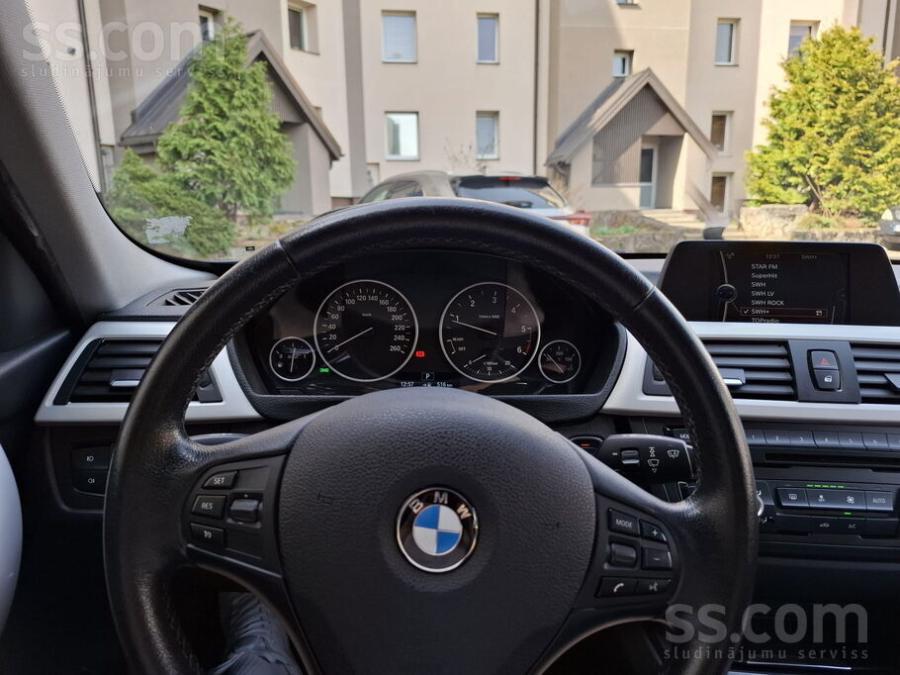 Black BMW 318 2013 in Riga, with an engine capacity of 2.00 L and mileage of 313 thousand km for 7200 €, photo 10 on AUTOMOTO.COM.LV