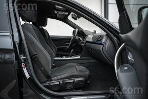 Black BMW 318 2013 in Riga, with an engine capacity of 2.00 L and mileage of 0 thousand km for 10650 €, photo 11 on AUTOMOTO.COM.LV