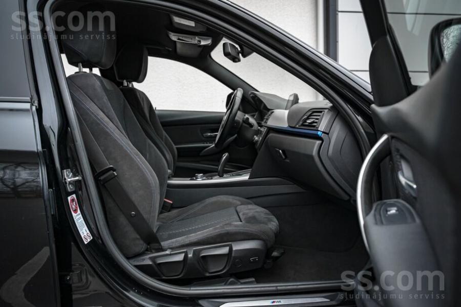 Black BMW 318 2013 in Riga, with an engine capacity of 2.00 L and mileage of 0 thousand km for 10650 €, photo 11 on AUTOMOTO.COM.LV