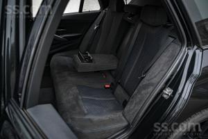 Black BMW 318 2013 in Riga, with an engine capacity of 2.00 L and mileage of 0 thousand km for 10650 €, photo 12 on AUTOMOTO.COM.LV