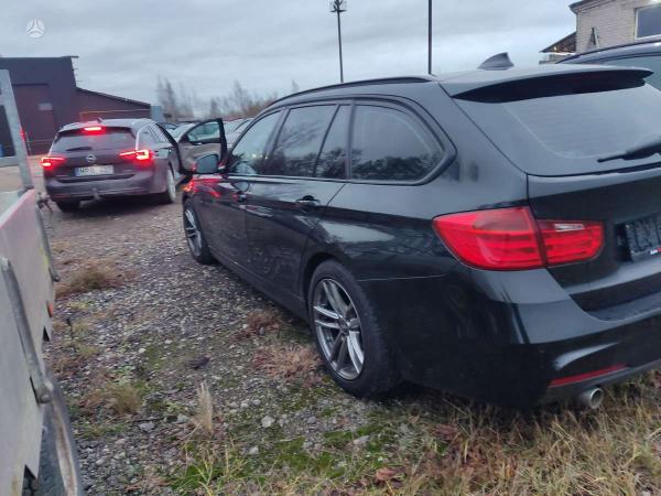 Black BMW 318 2013 in Pakruojis, with an engine capacity of 2.00 L and mileage of 274 thousand km for 6750 €, photo 3 on AUTOMOTO.COM.LV