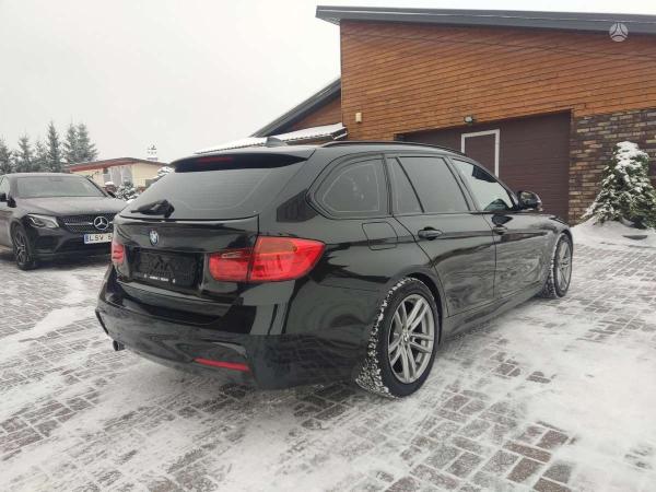 Black BMW 318 2013 in Pakruojis, with an engine capacity of 2.00 L and mileage of 274 thousand km for 7350 €, photo 4 on AUTOMOTO.COM.LV