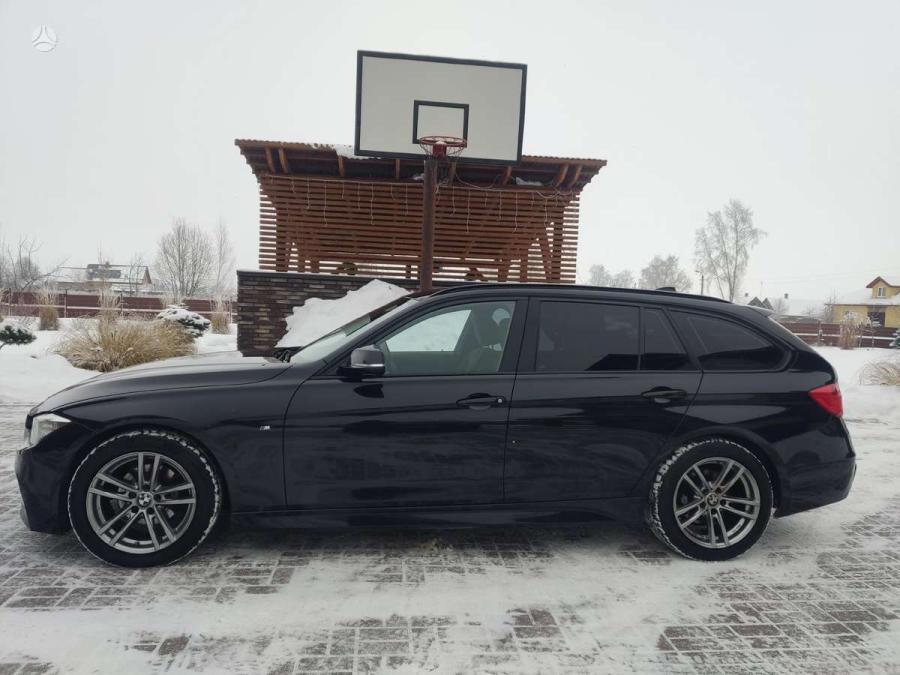 Black BMW 318 2013 in Pakruojis, with an engine capacity of 2.00 L and mileage of 274 thousand km for 7350 €, photo 5 on AUTOMOTO.COM.LV