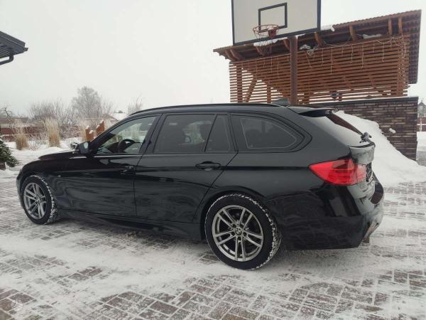 Black BMW 318 2013 in Pakruojis, with an engine capacity of 2.00 L and mileage of 274 thousand km for 7350 €, photo 6 on AUTOMOTO.COM.LV