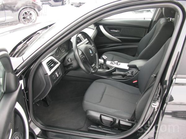 Black BMW 318 2013 in Riga, with an engine capacity of 2.00 L and mileage of 272 thousand km for 6550 €, photo 10 on AUTOMOTO.COM.LV