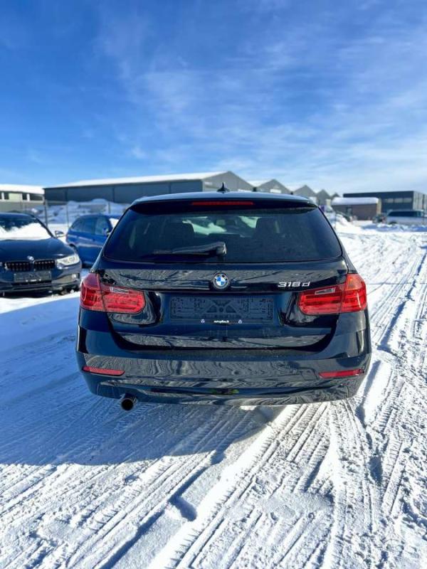 Black BMW 318 2013 in Kaunas, with an engine capacity of 2.00 L and mileage of 236 thousand km for 7300 €, photo 6 on AUTOMOTO.COM.LV