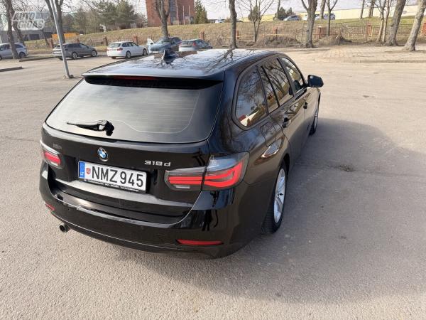 Black BMW 318 2013 in Klaipeda, with an engine capacity of 2.00 L and mileage of 313 thousand km for 7200 €, photo 1 on AUTOMOTO.COM.LV
