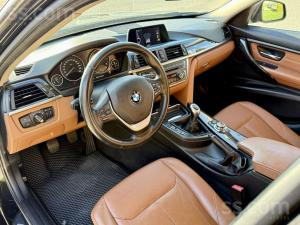 Black BMW 318 2013 in Riga, with an engine capacity of 2.00 L and mileage of 355 thousand km for 5550 €, photo 15 on AUTOMOTO.COM.LV