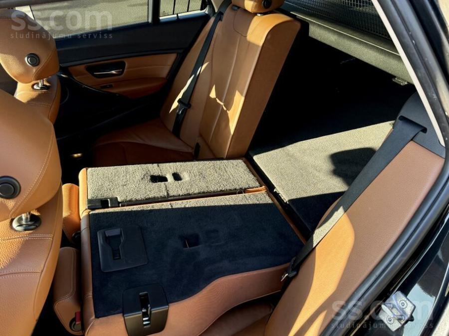 Black BMW 318 2013 in Riga, with an engine capacity of 2.00 L and mileage of 355 thousand km for 5550 €, photo 19 on AUTOMOTO.COM.LV