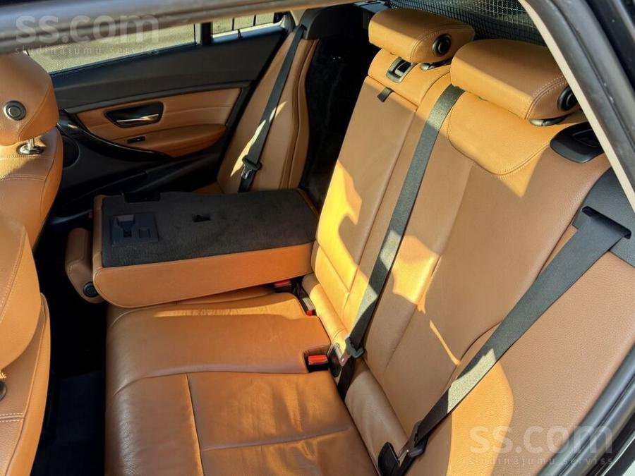 Black BMW 318 2013 in Riga, with an engine capacity of 2.00 L and mileage of 355 thousand km for 5550 €, photo 20 on AUTOMOTO.COM.LV