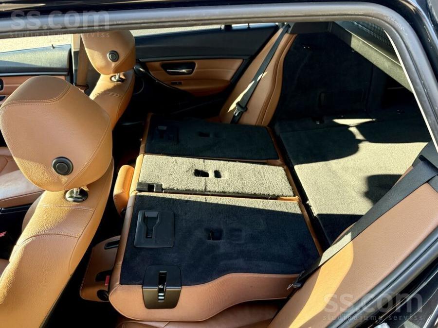 Black BMW 318 2013 in Riga, with an engine capacity of 2.00 L and mileage of 355 thousand km for 5550 €, photo 21 on AUTOMOTO.COM.LV