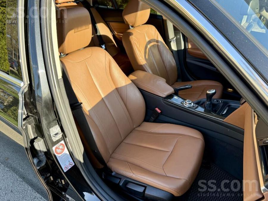 Black BMW 318 2013 in Riga, with an engine capacity of 2.00 L and mileage of 355 thousand km for 5550 €, photo 26 on AUTOMOTO.COM.LV