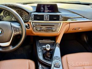 Black BMW 318 2013 in Riga, with an engine capacity of 2.00 L and mileage of 355 thousand km for 5550 €, photo 29 on AUTOMOTO.COM.LV