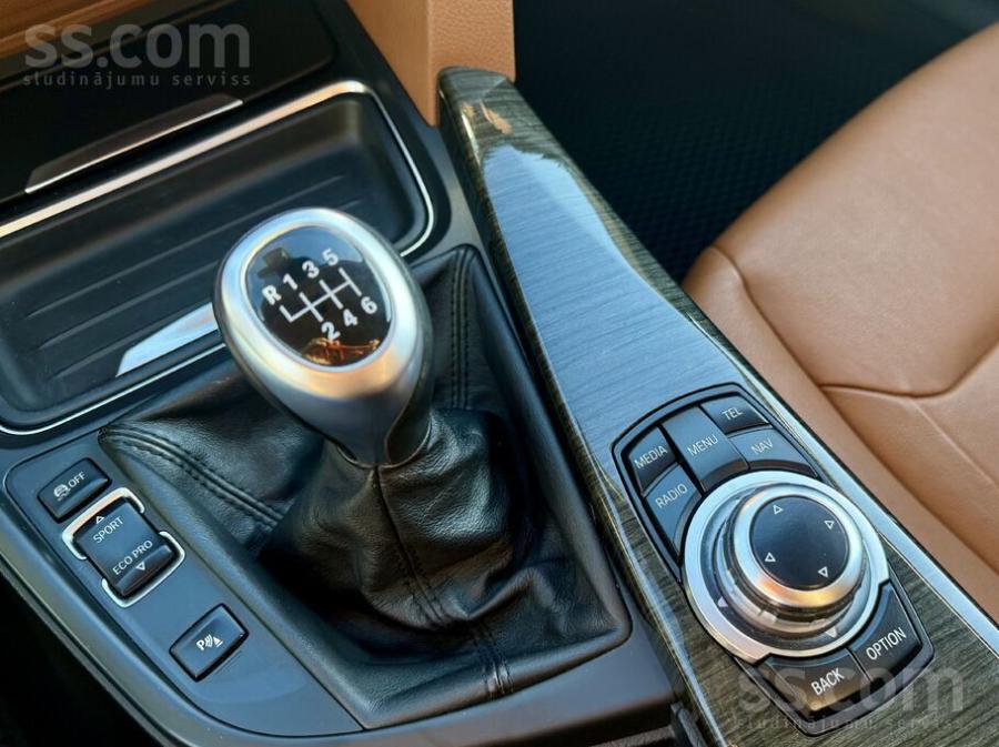 Black BMW 318 2013 in Riga, with an engine capacity of 2.00 L and mileage of 355 thousand km for 5550 €, photo 31 on AUTOMOTO.COM.LV