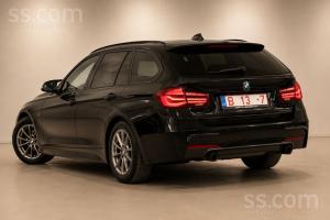 Black BMW 318 2013 in Tukums, with an engine capacity of 2.00 L and mileage of 243 thousand km for 10900 €, photo 5 on AUTOMOTO.COM.LV