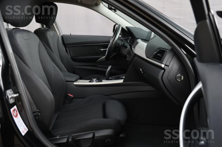 Black BMW 318 2013 in Tukums, with an engine capacity of 2.00 L and mileage of 243 thousand km for 10900 €, photo 7 on AUTOMOTO.COM.LV