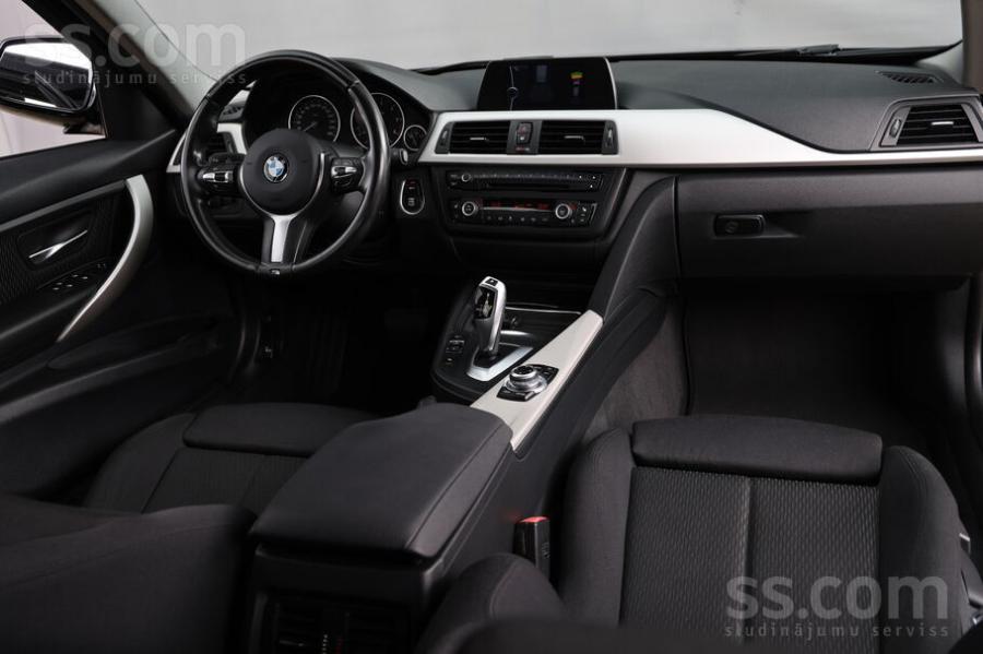 Black BMW 318 2013 in Tukums, with an engine capacity of 2.00 L and mileage of 243 thousand km for 10900 €, photo 12 on AUTOMOTO.COM.LV