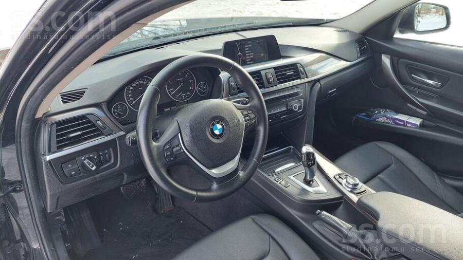 Black BMW 318 2013 in Liepaja, with an engine capacity of 2.00 L and mileage of 327 thousand km for 8500 €, photo 5 on AUTOMOTO.COM.LV